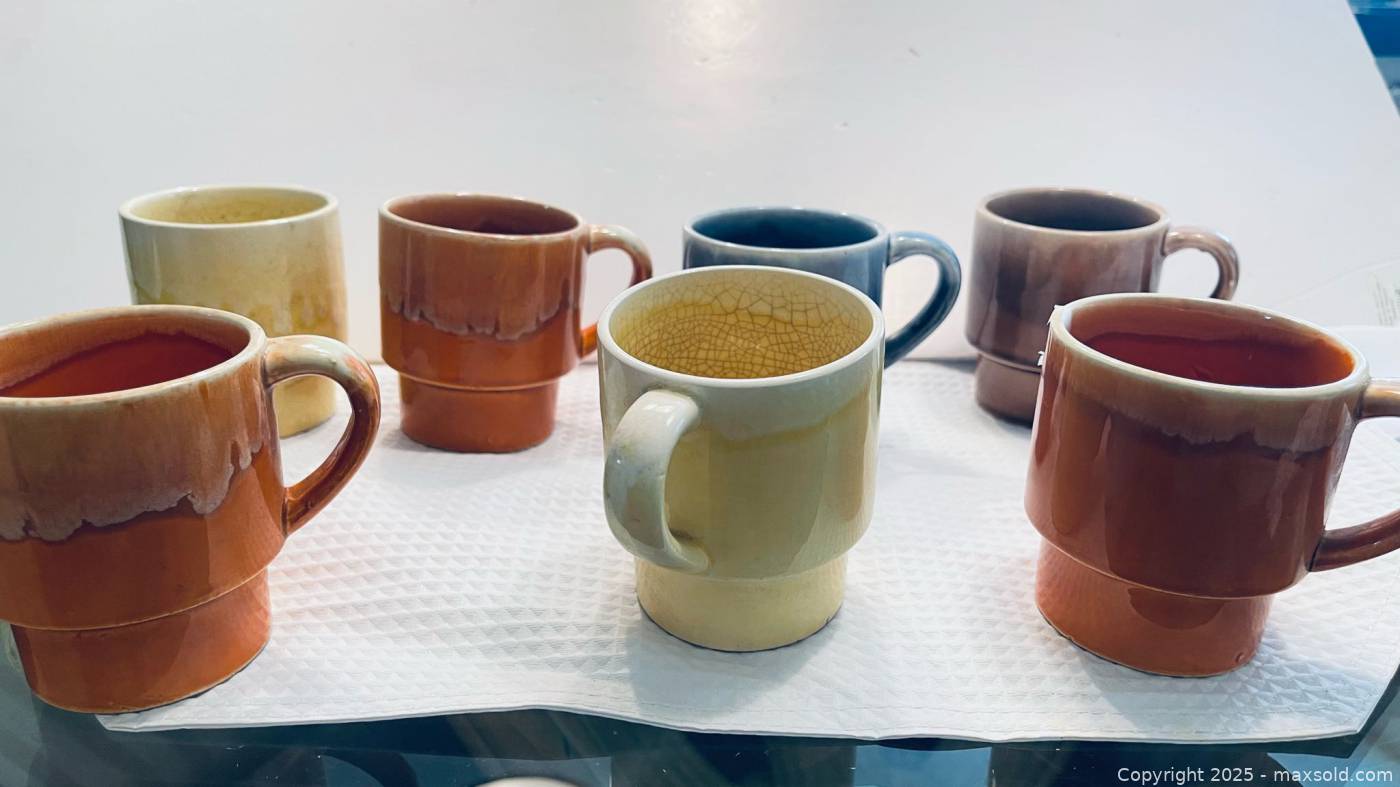 Set of seven retro ceramic nesting mugs | Maxsold