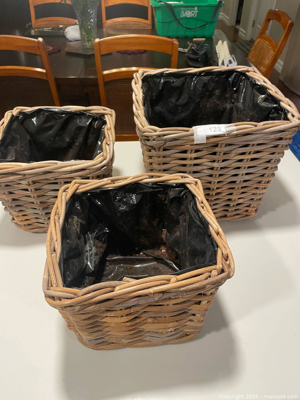 Three wicker square planters | Maxsold