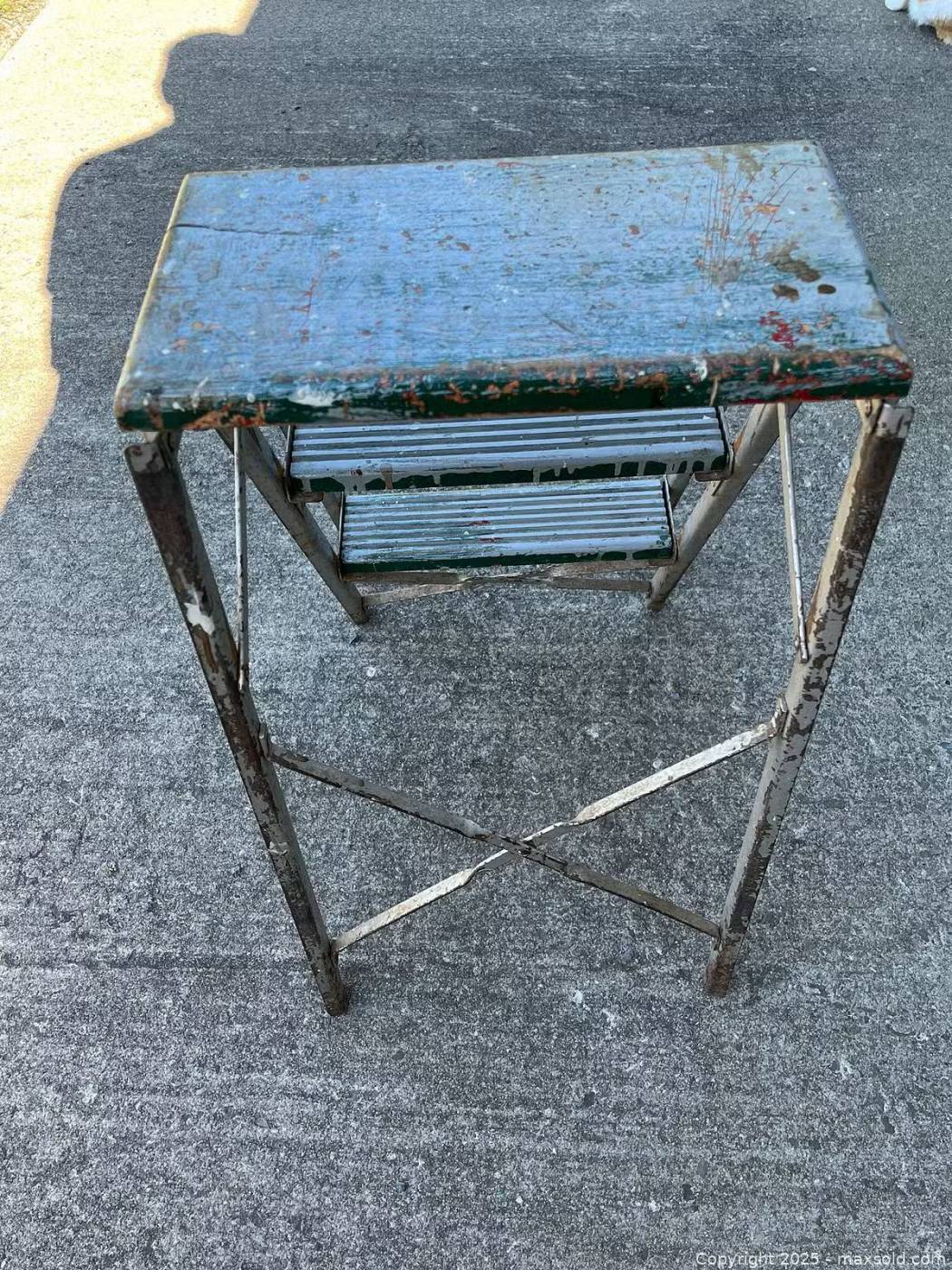 Vintage 2-step folding metal ladder | Maxsold