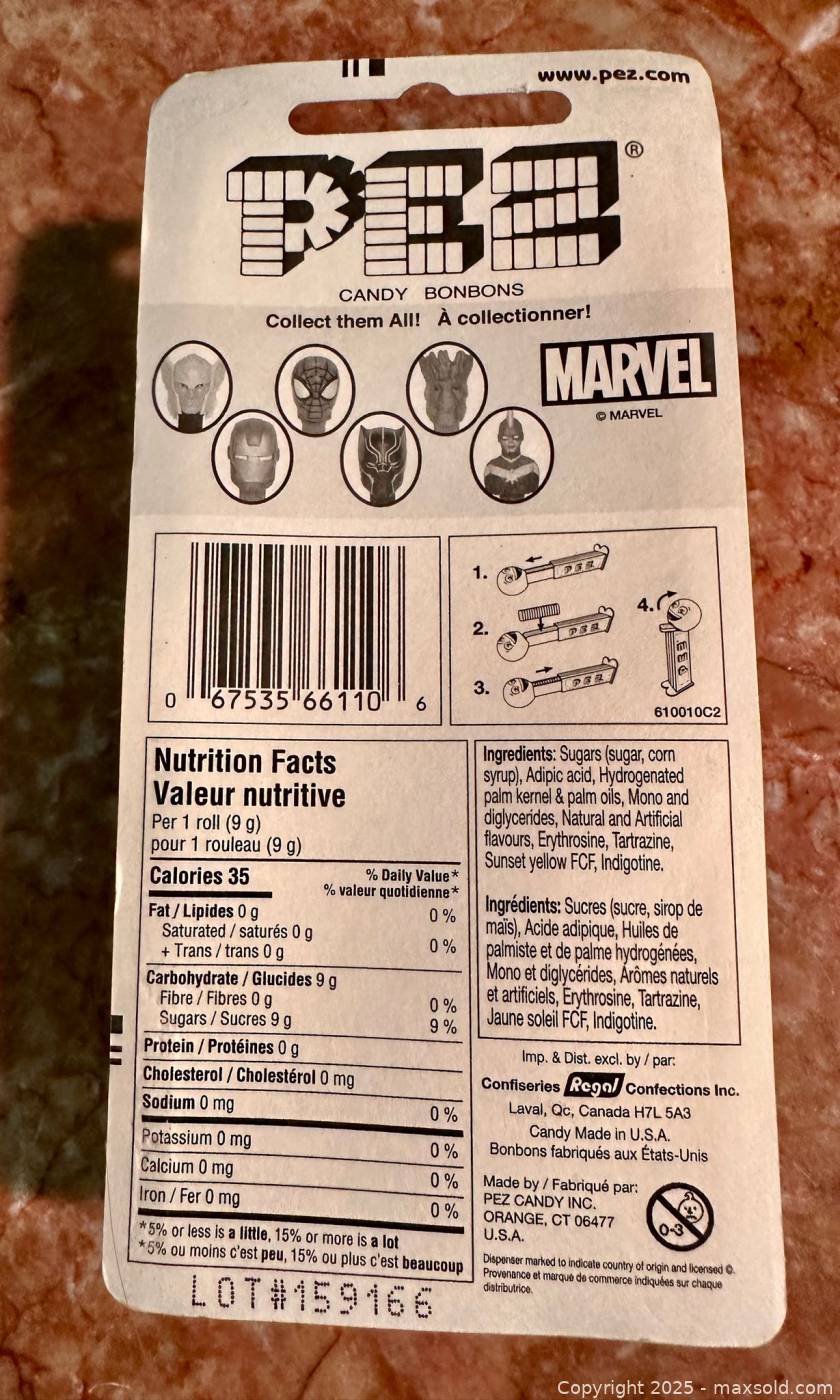 Sealed PEZ Venom & Poop Emoji Dispensers | Maxsold