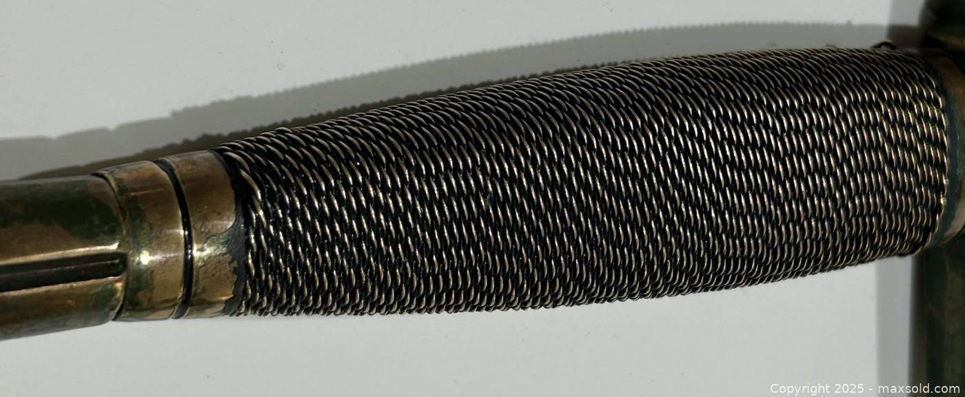 Long sword with brass pommel | Maxsold