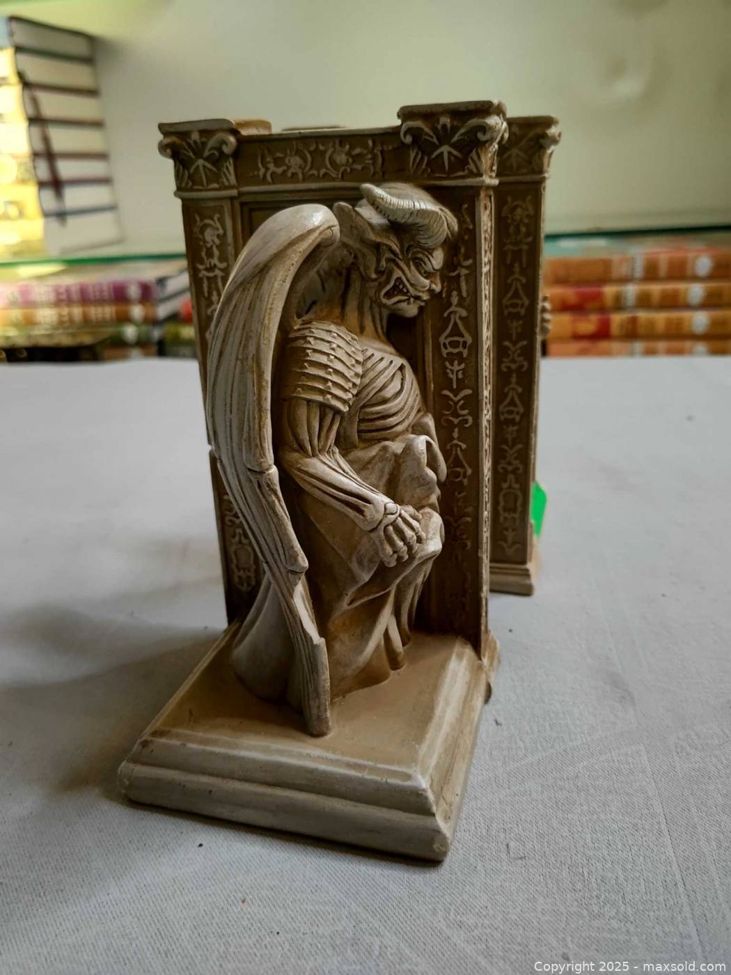 Angels & Demons limited edition bookends | Maxsold