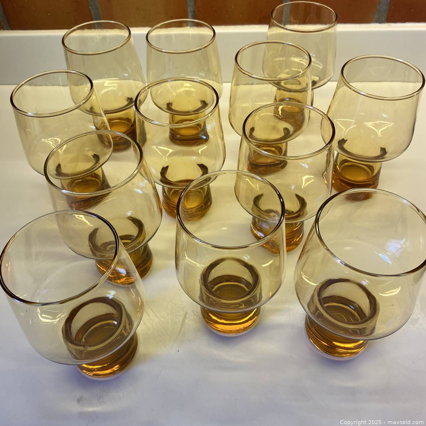 Set of 12 mid-century amber glasses | Maxsold