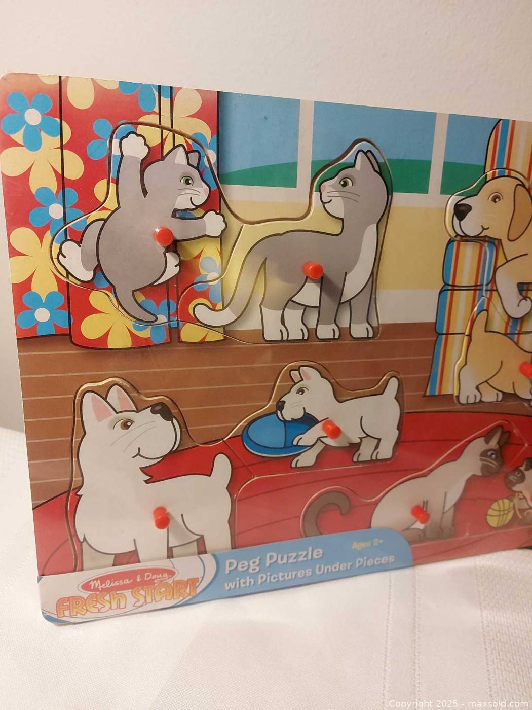 Melissa & Doug wooden dog peg puzzle | Maxsold