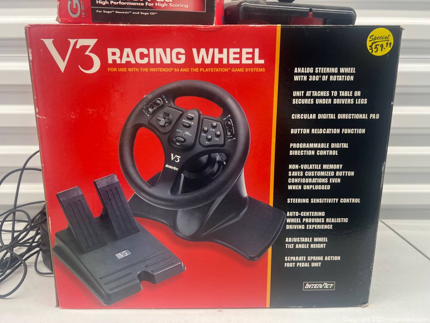 Two Sega Genesis consoles, four Genesis controllers, InterAct V3 Racing ...