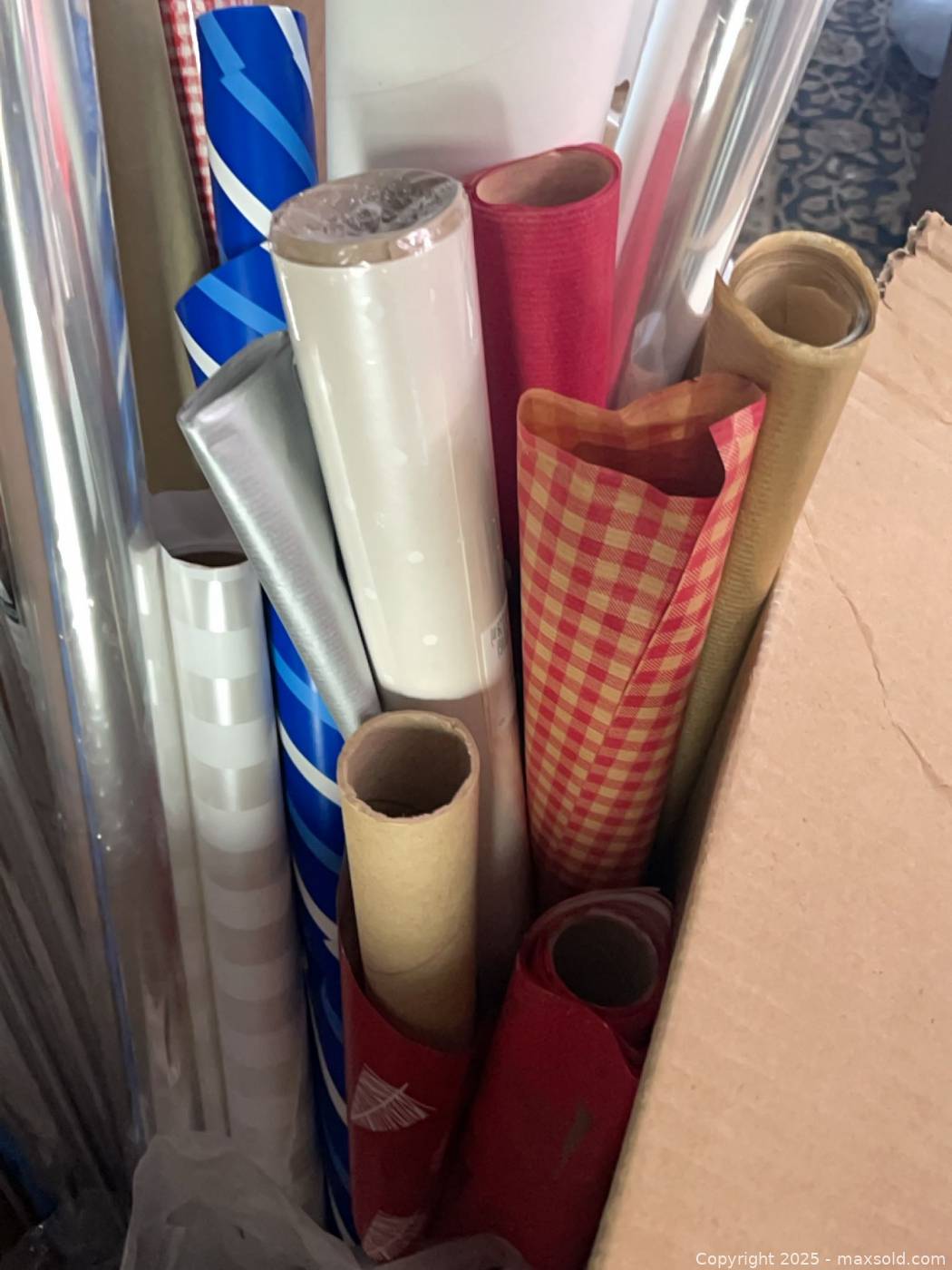 Assorted gift wrap rolls, ribbons, totes | Maxsold