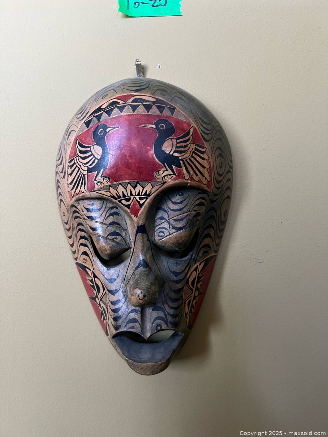 Shaw Festival posters, carved masks, wall clock | Maxsold