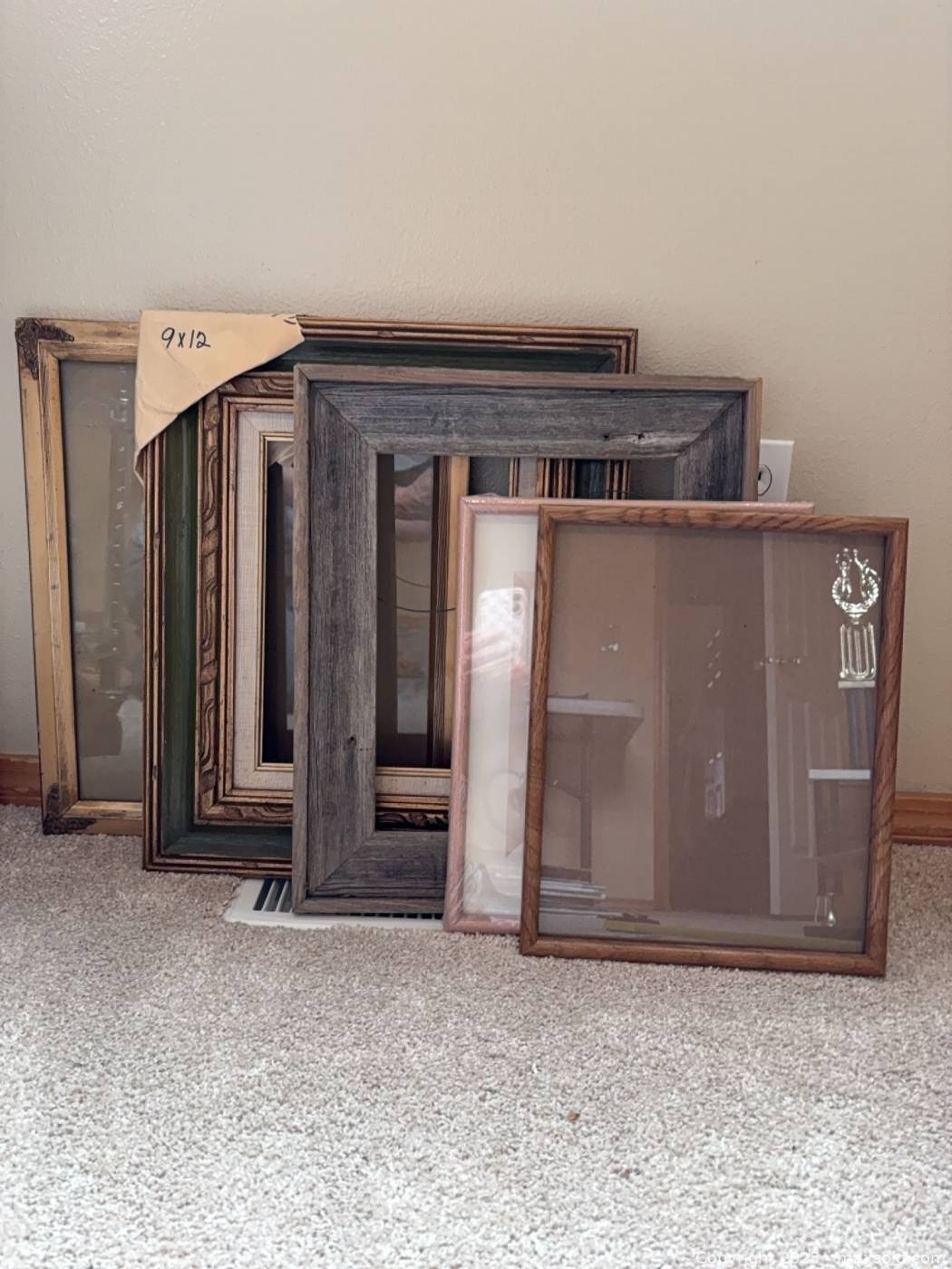 Five assorted picture frames | Maxsold