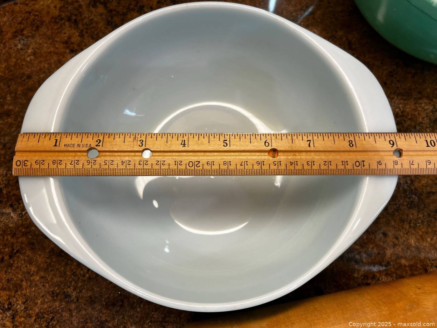 Vintage Pyrex mixing bowls and wooden rolling pin | Maxsold