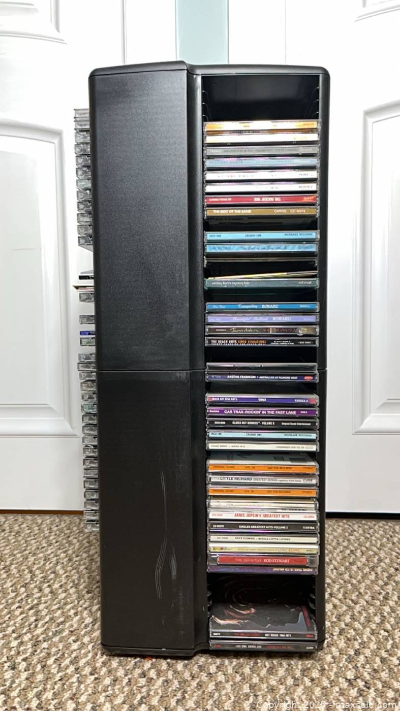 Swivel CD tower holder with approx. 50 CDs | Maxsold
