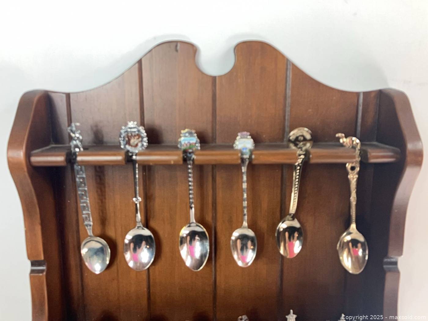 Collectible souvenir spoons with display rack | Maxsold