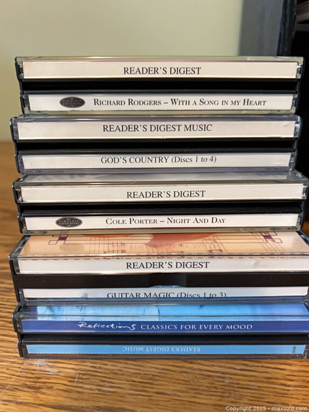 CD storage tower with country CDs & cassettes | Maxsold