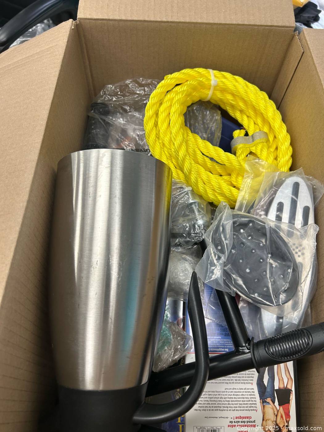 Umbra photo frame, stainless carafe, rope, utensil and assorted DVDs ...