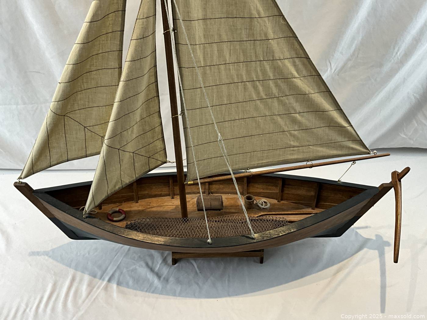 Large wooden sailing boat model on stand | Maxsold
