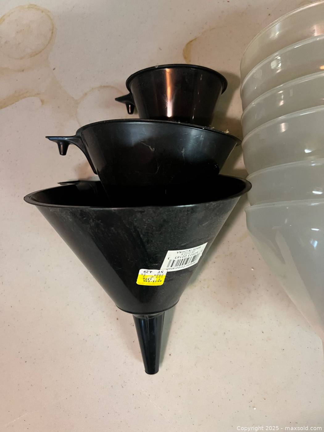 6 Clear Funnels, 3 Black Funnels, 2 Blue Tarps, Squeegee | Maxsold