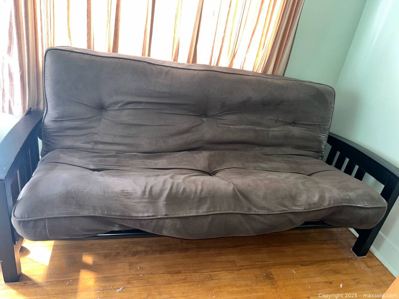 Black wood frame futon sofa bed | Maxsold