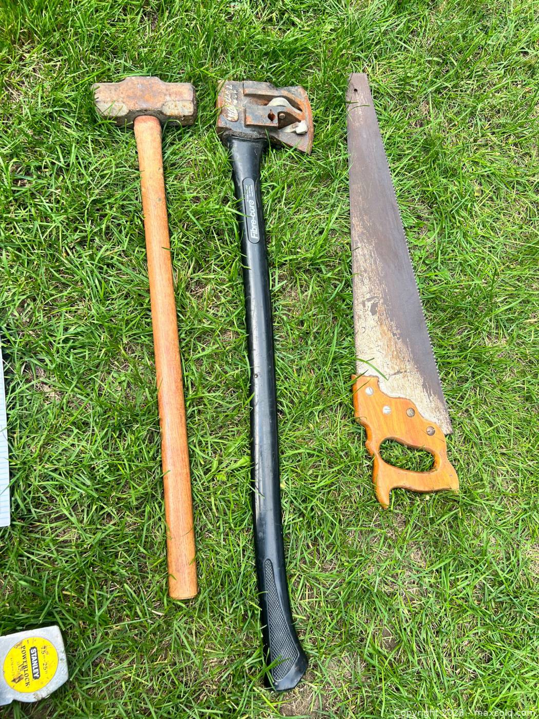 Long handle axe, sledge hammer, hand saw | Maxsold