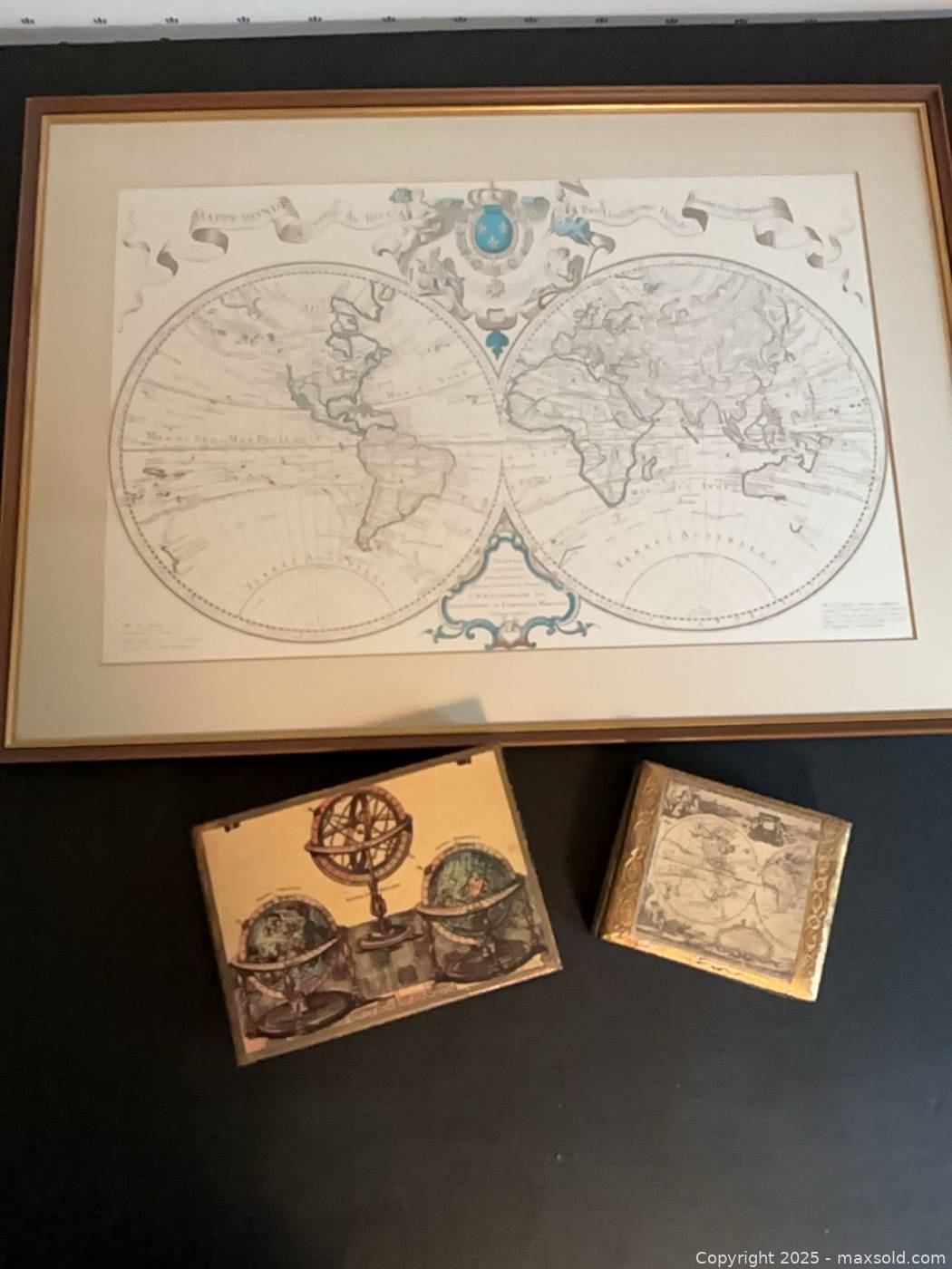 Framed double-hemisphere world map print with two cartographic wooden ...