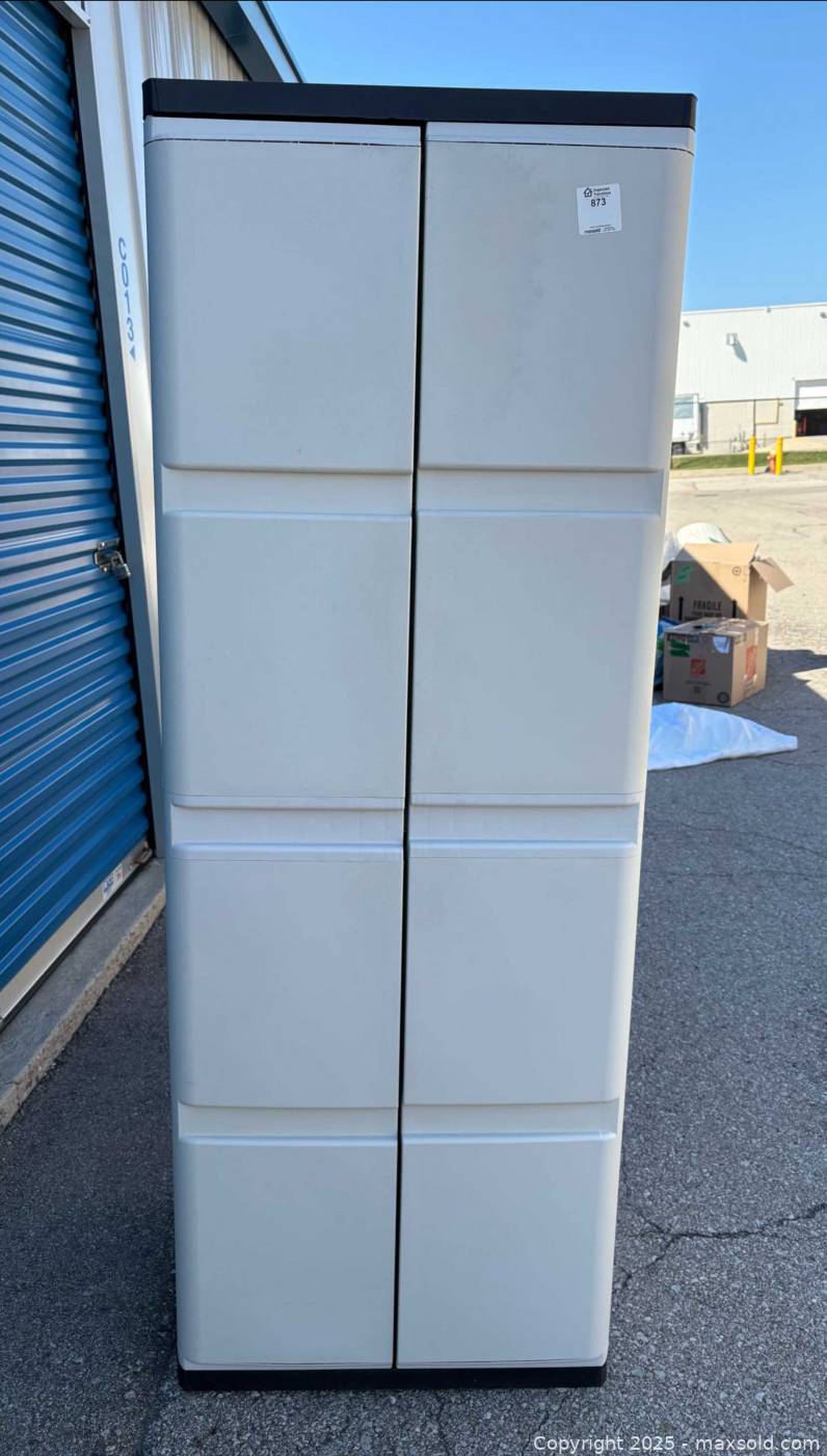 Two tall plastic storage cabinets | Maxsold