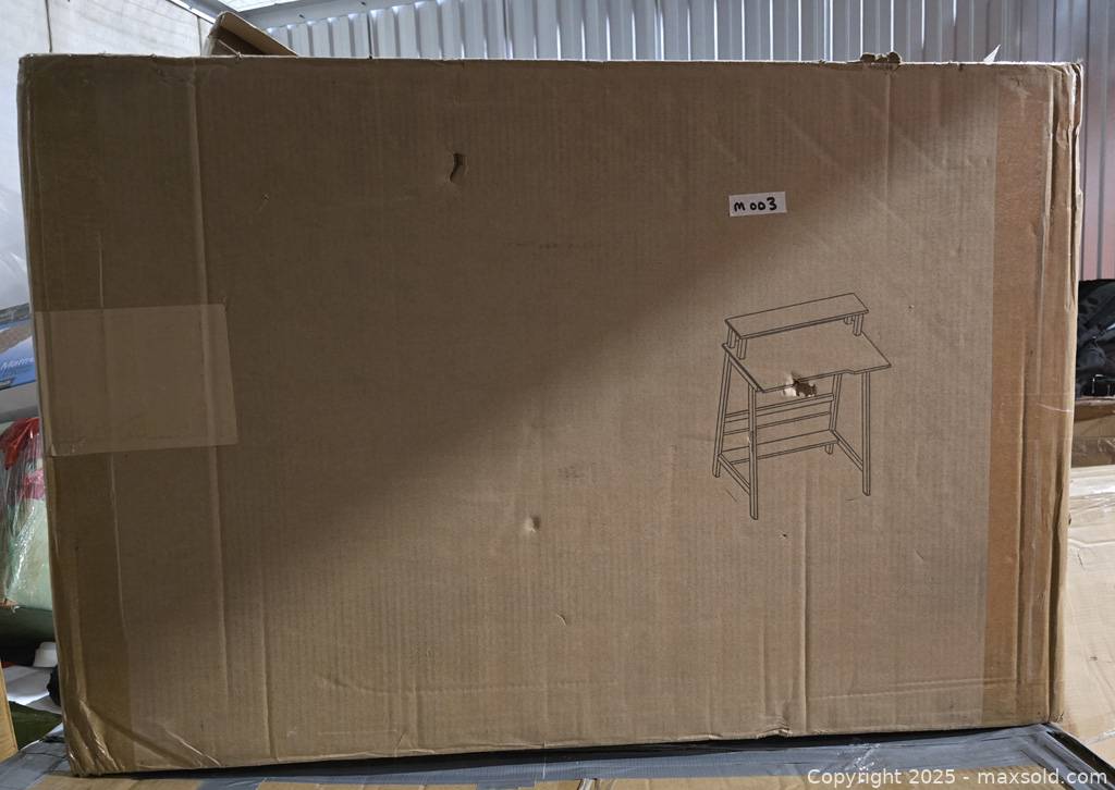 Unassembled computer desk in box | Maxsold
