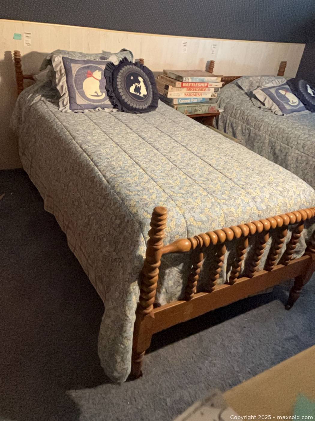 Twin spool-turned wood bed with mattress | Maxsold