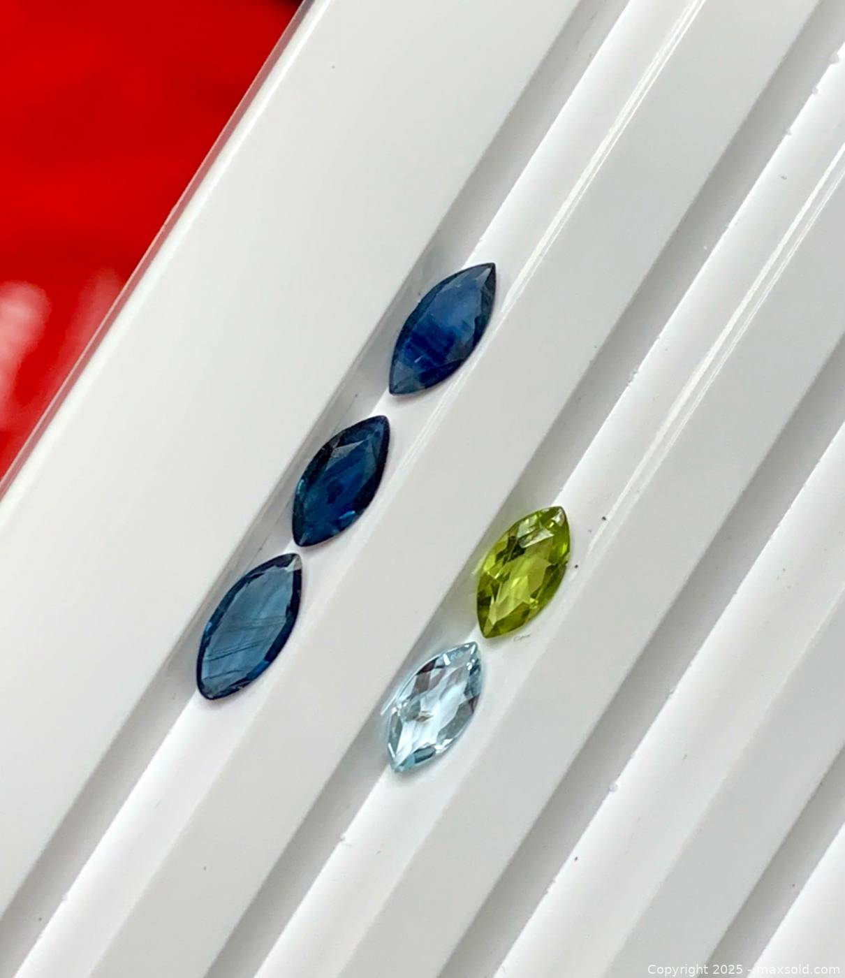 Five marquise-cut natural gemstones | Maxsold