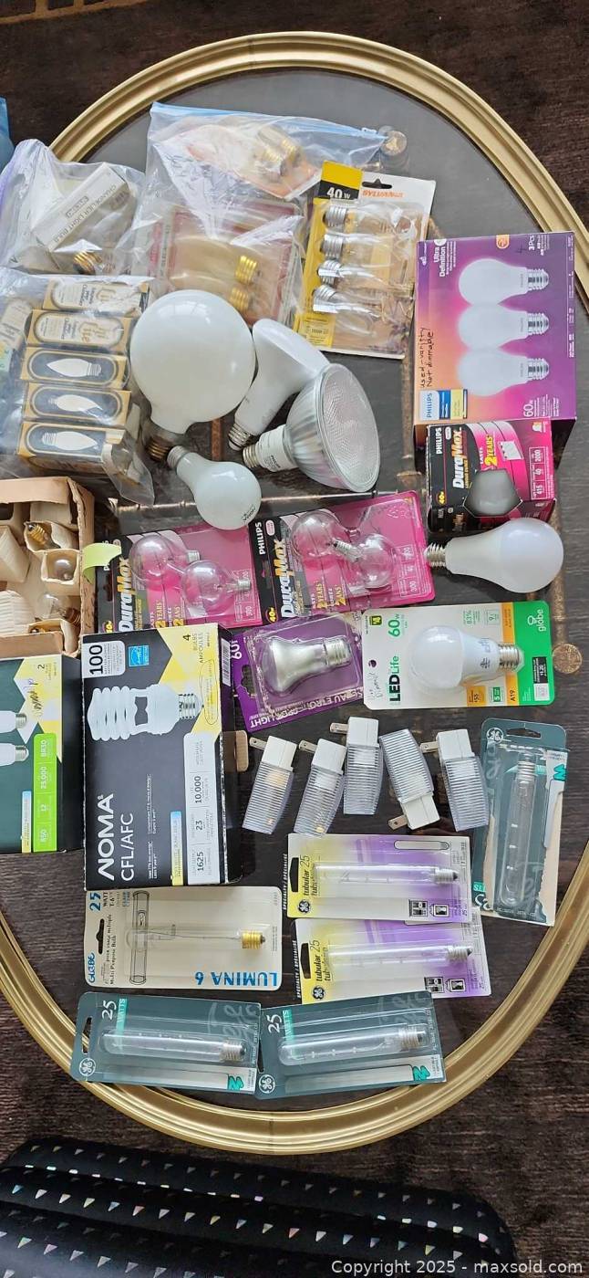 Assortment of LED, CFL, incandescent bulbs & plug-in nightlights | Maxsold