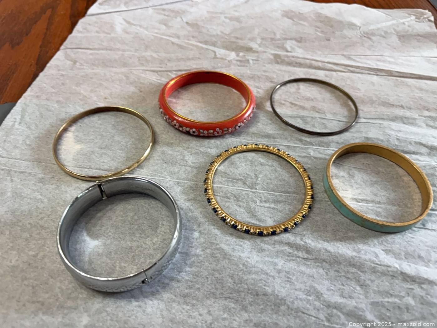 Six assorted bangle bracelets | Maxsold