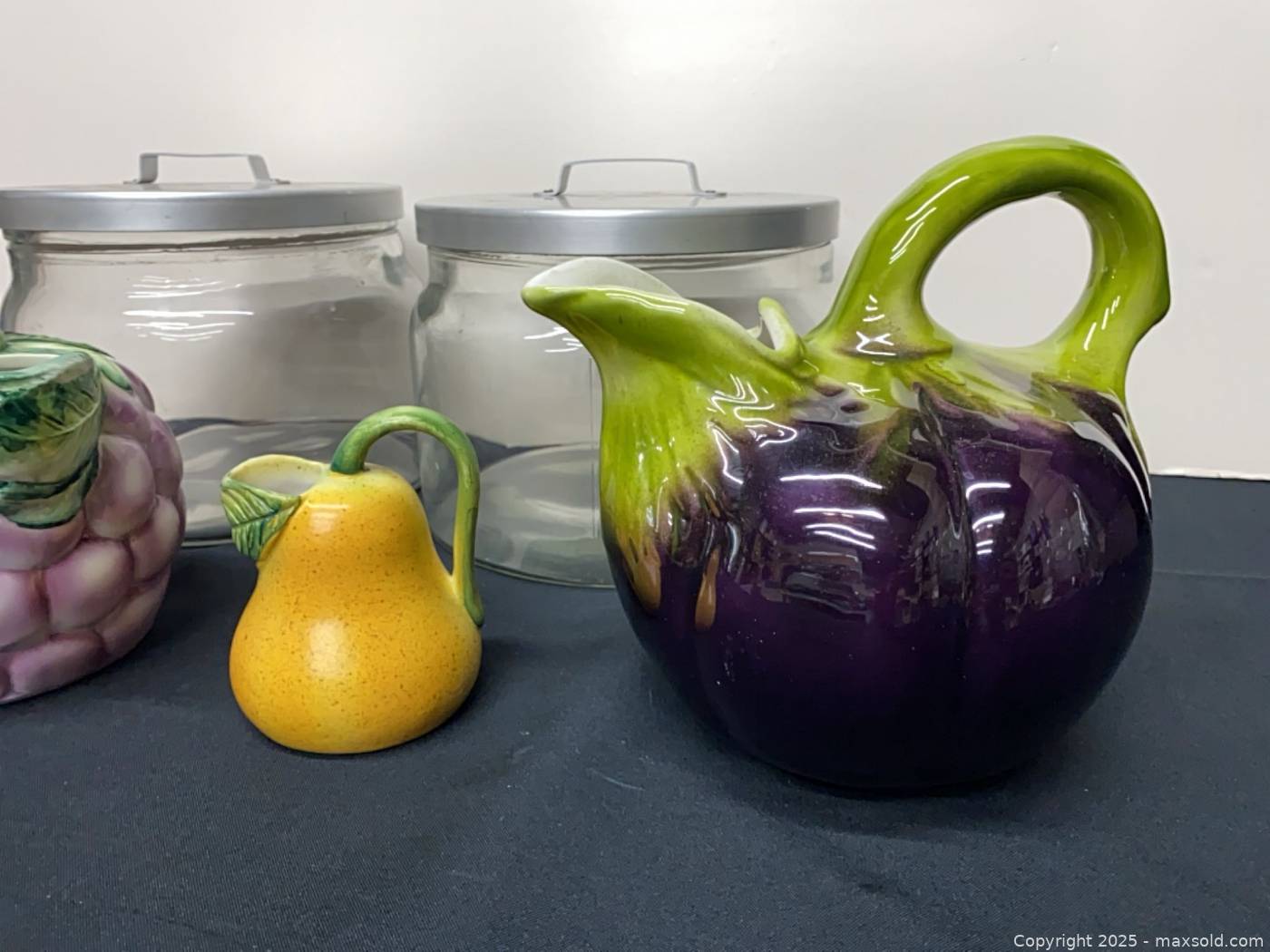 Italian ceramic fruit pitchers and IKEA glass jars | Maxsold