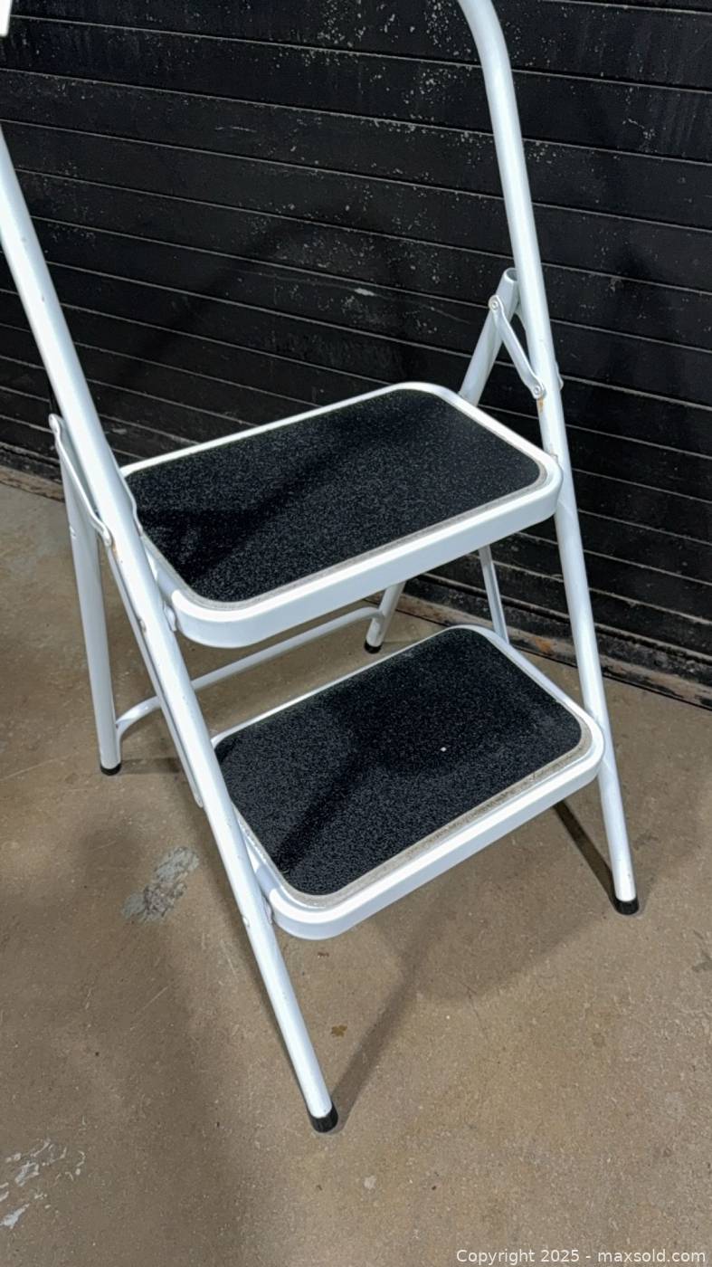 Metal folding two-step stool | Maxsold