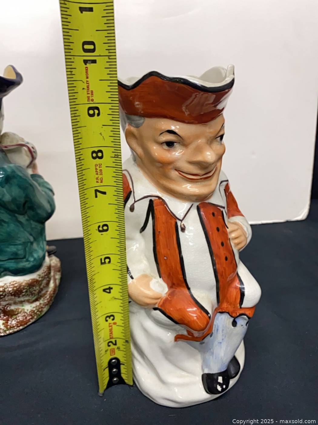 Three ceramic Toby character pitchers | Maxsold