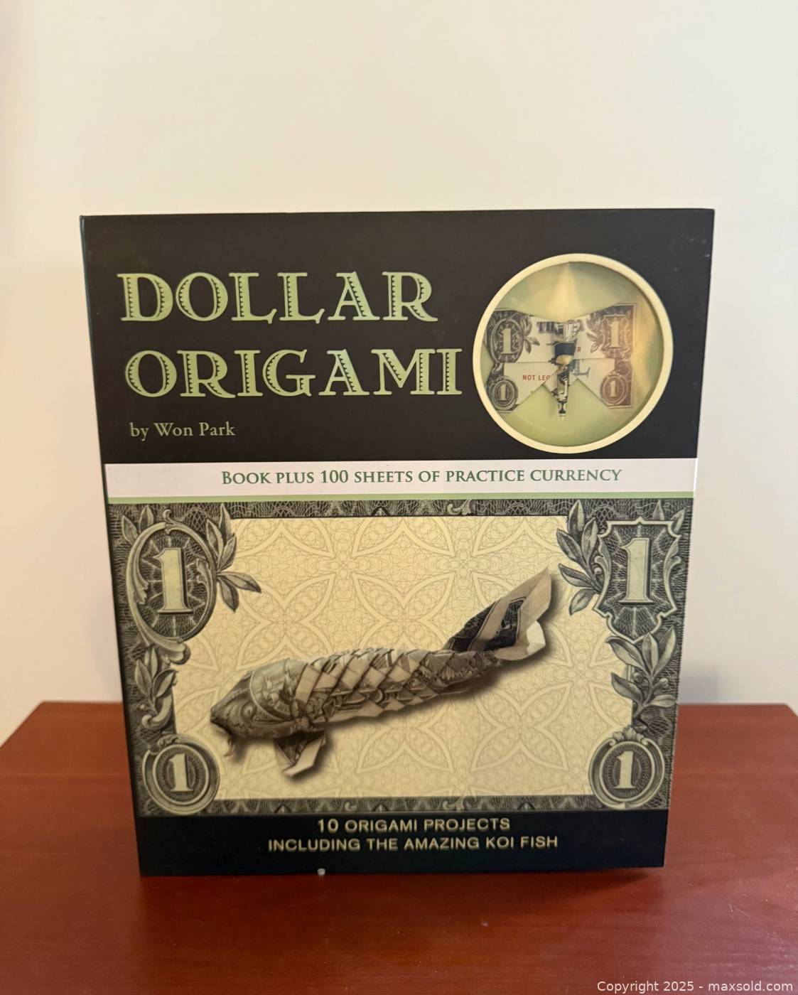 Dollar Origami book with 100 practice bills | Maxsold