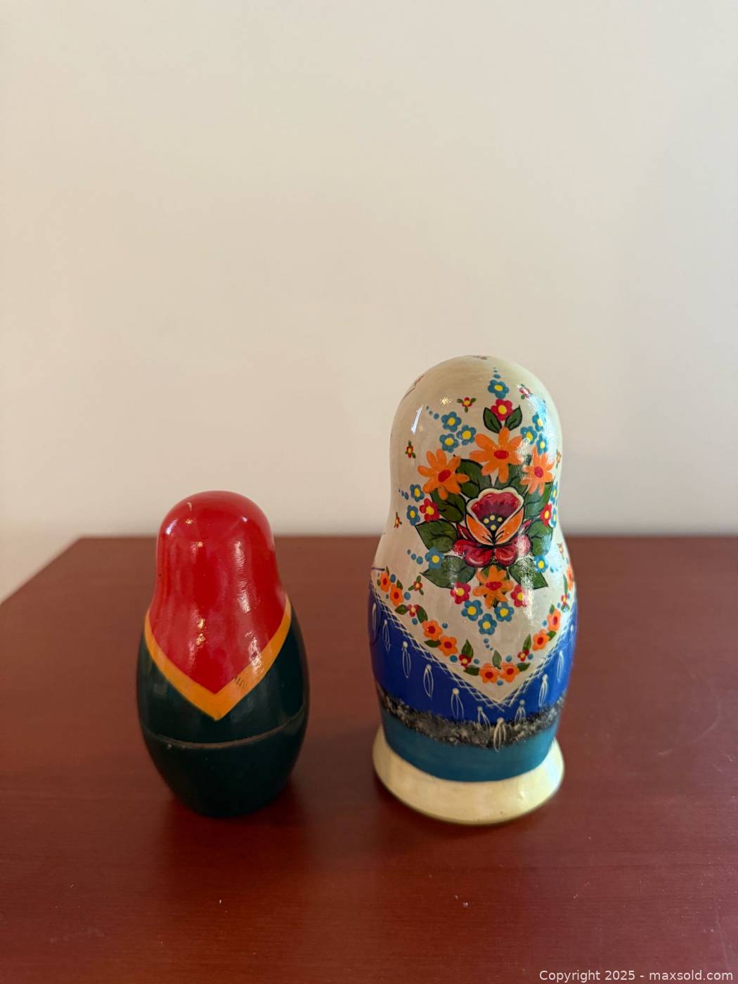 Vintage hand painted wooden nesting dolls 7-piece | Maxsold