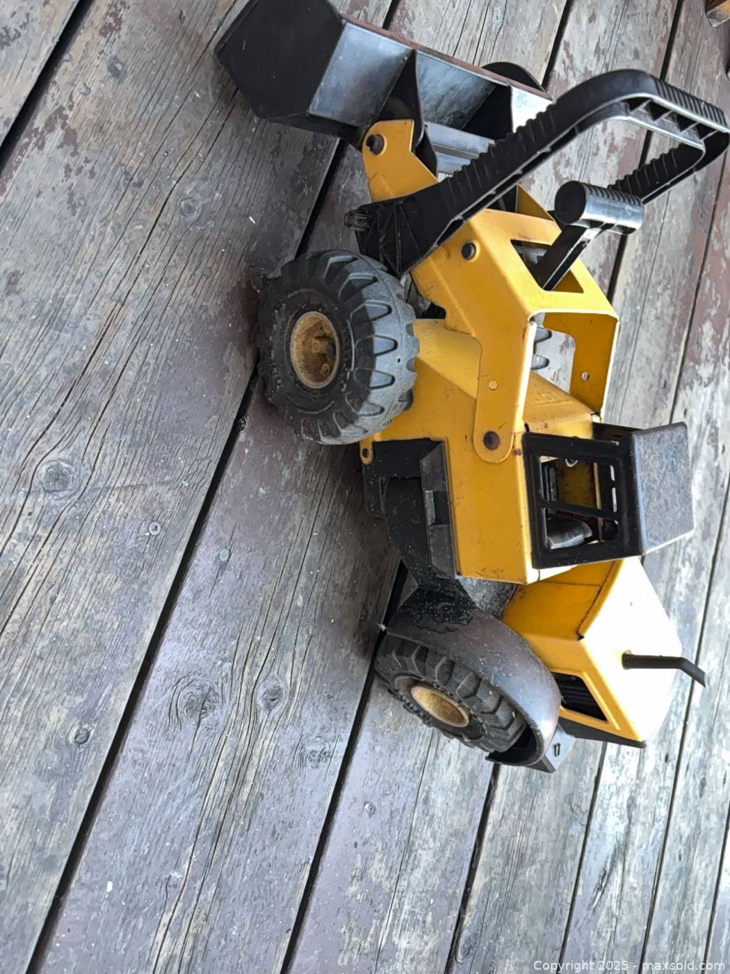 1997 Tonka metal and plastic loader | Maxsold