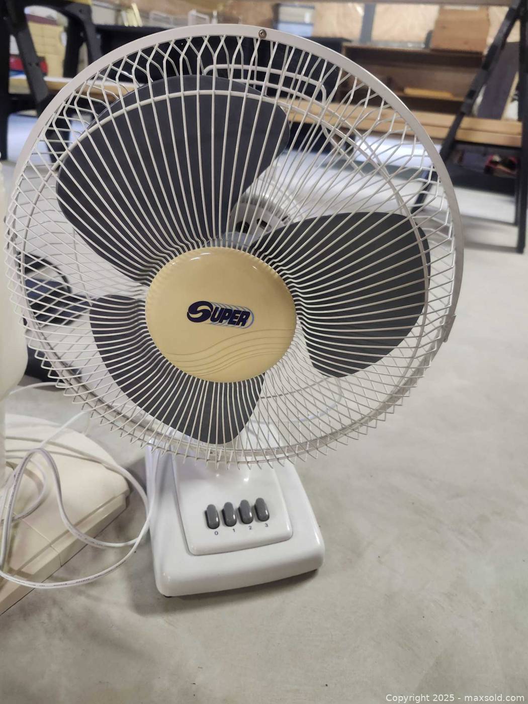 Garrison tower fan with remote and Super table fan | Maxsold