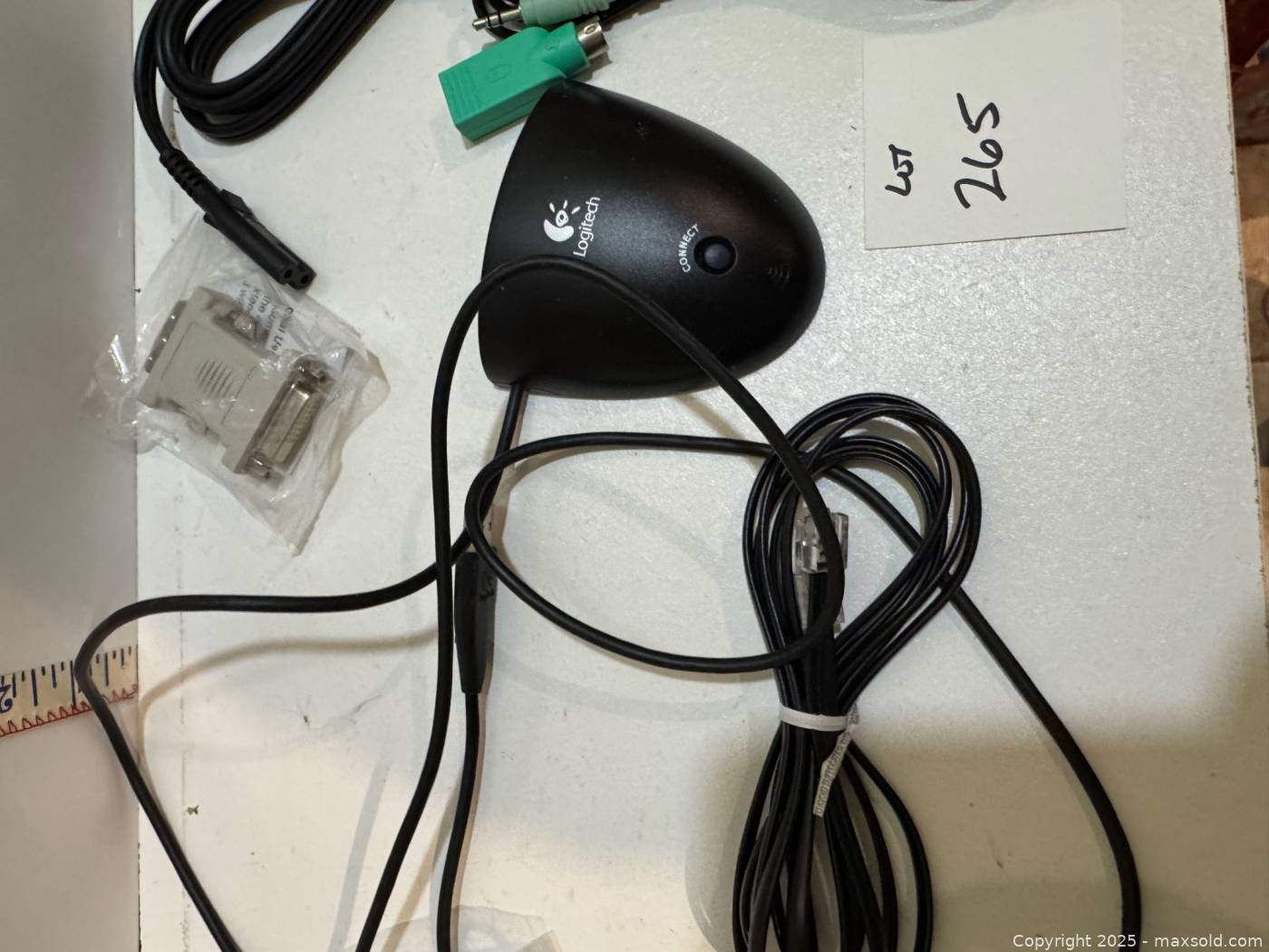 Logitech PS/2 mouse, PC power cords, DVI-VGA adapter, phone cord ...