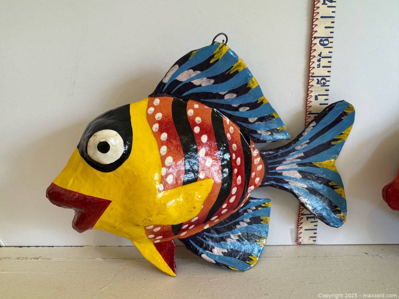 Colourful Caribbean hanging fish decor | Maxsold