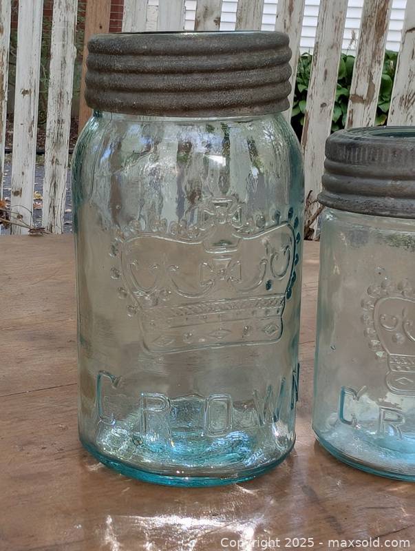 Pair of Crown embossed aqua glass fruit jars with zinc lids | Maxsold