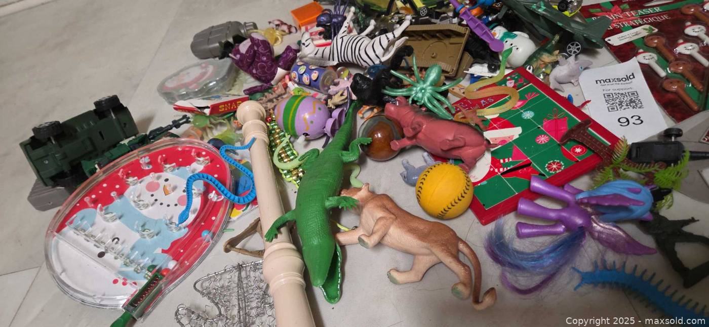 Assorted toy animals, recorder, puzzle packs | Maxsold