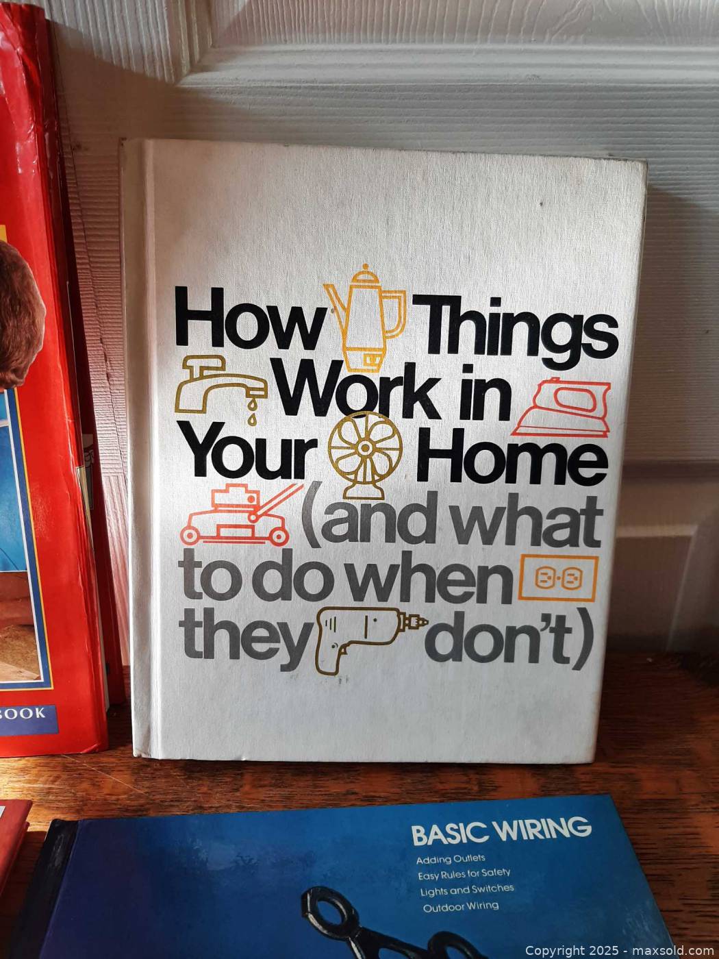 Four hardcover home maintenance books | Maxsold