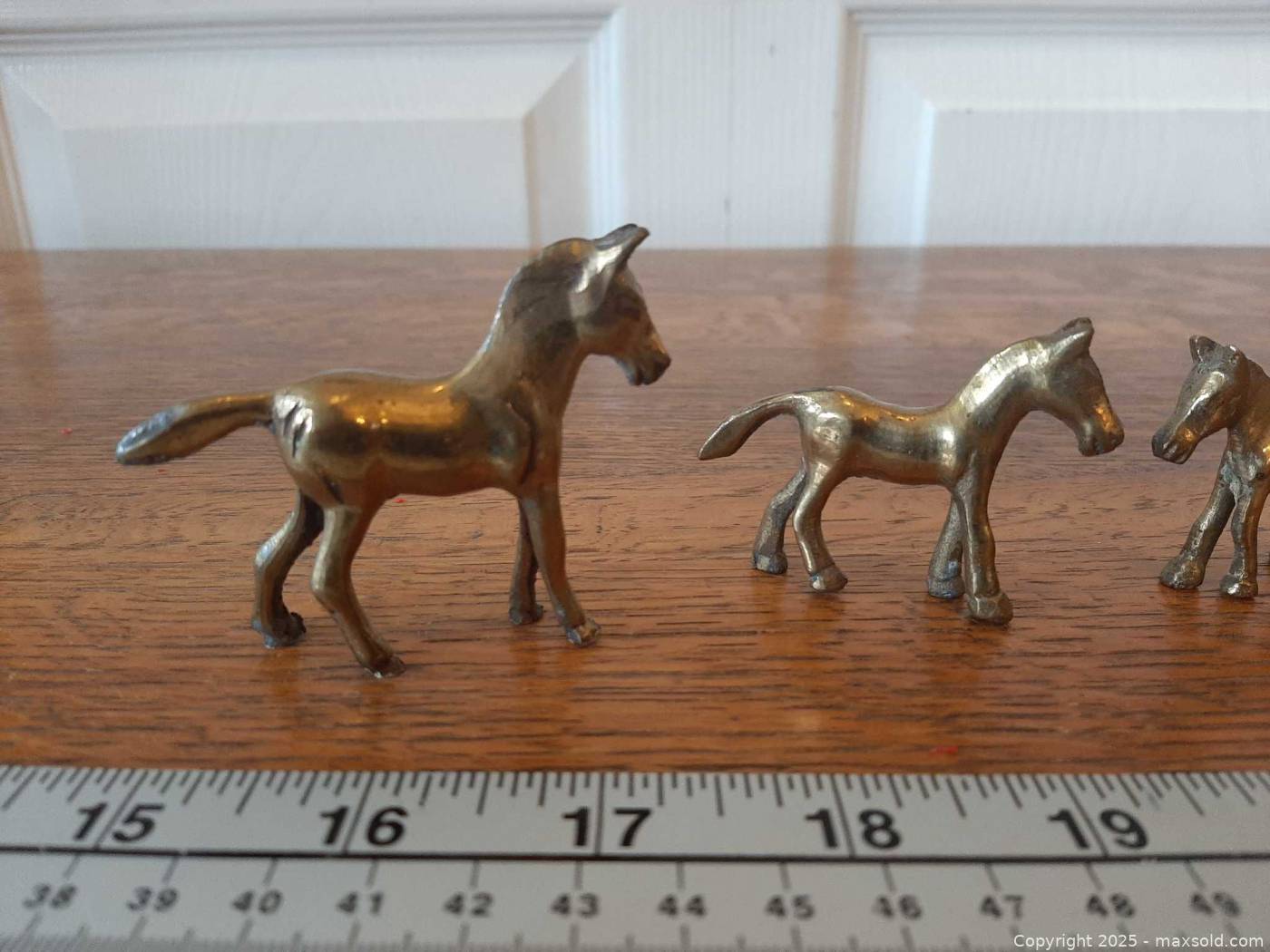 Four miniature solid brass horse figurines | Maxsold