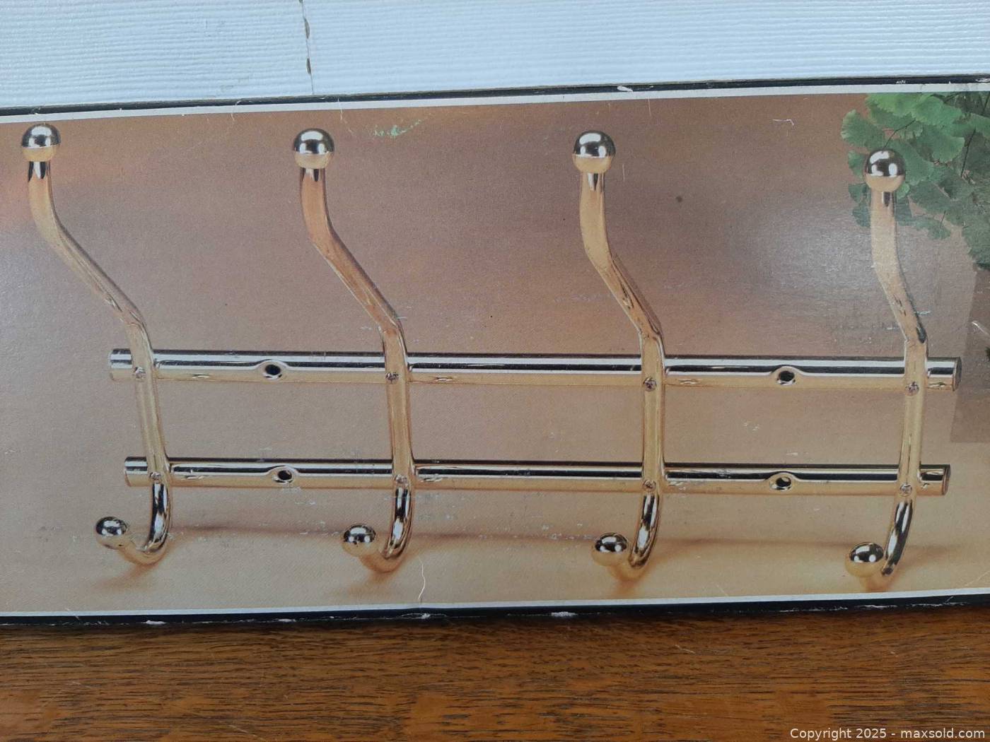 Brass wall hanger rack, NOS | Maxsold