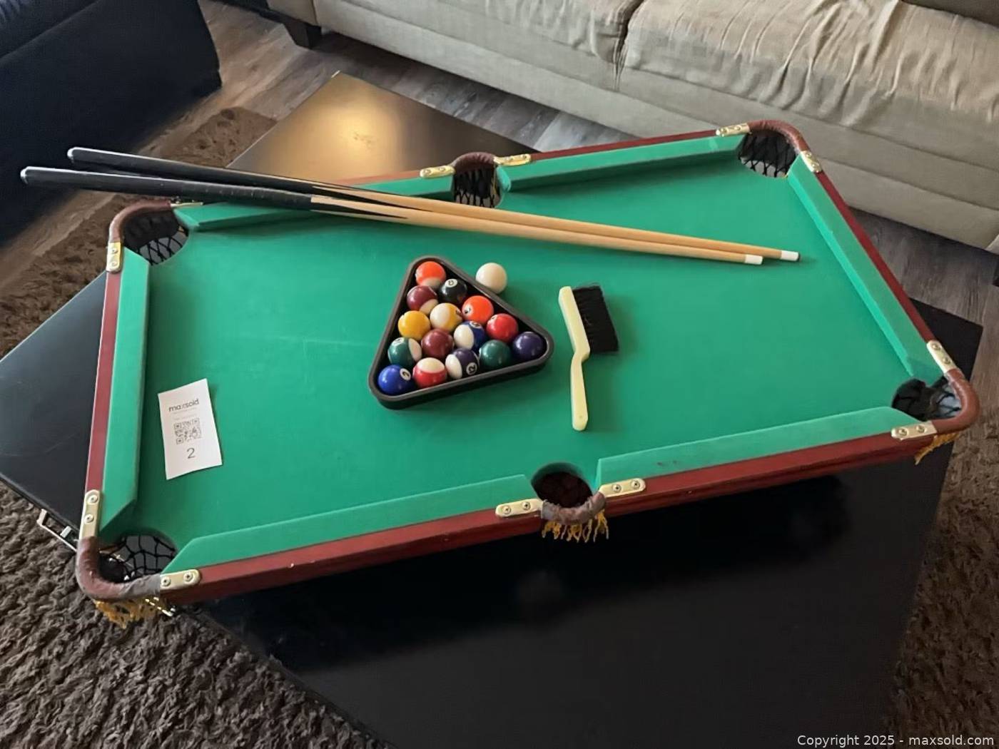 Tabletop pool table with accessories | Maxsold