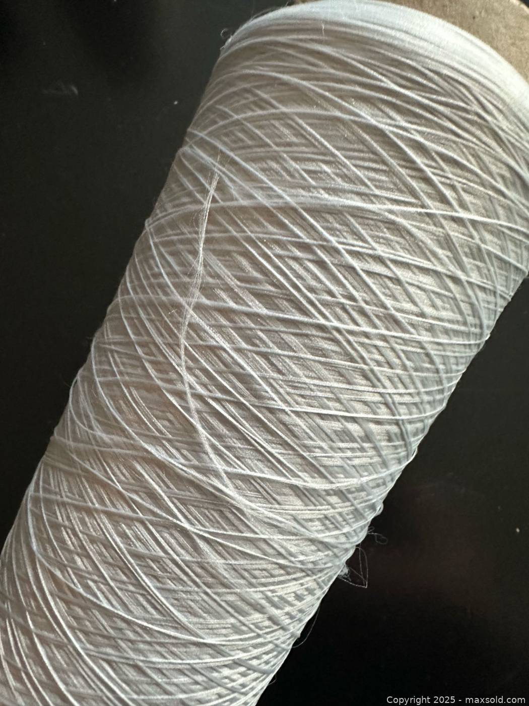 Nine industrial wooly nylon serger thread cones | Maxsold