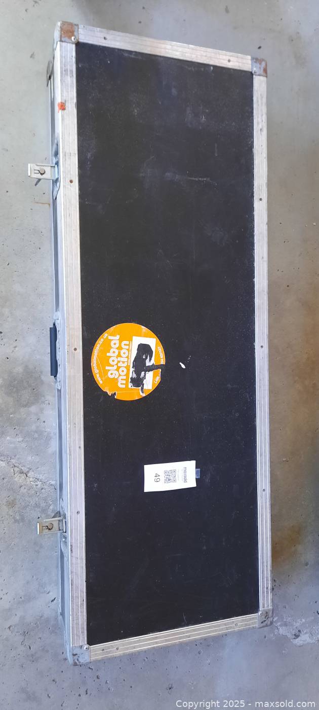 Hard carrying case with stands, cord, strap | Maxsold