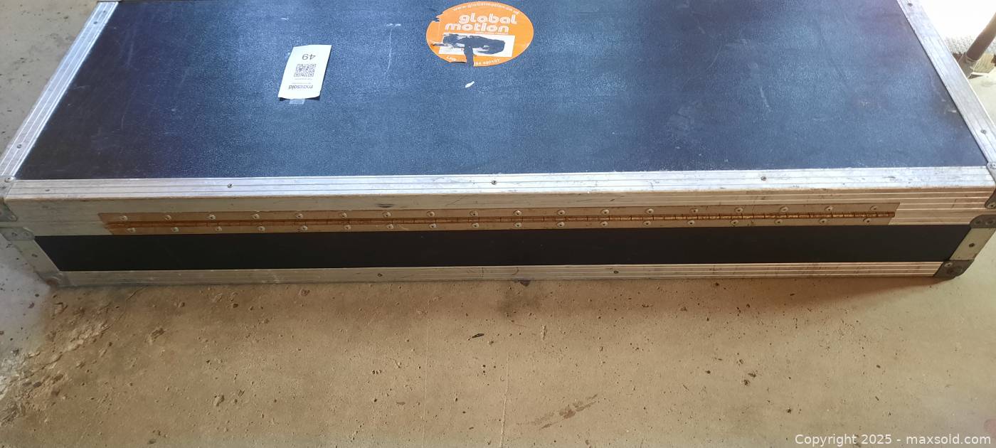 Hard carrying case with stands, cord, strap | Maxsold