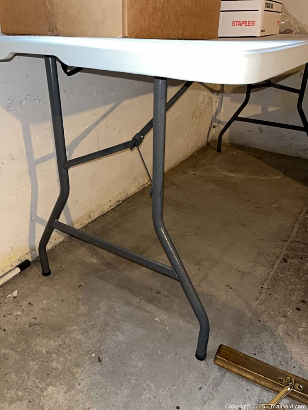 Four folding tables | Maxsold