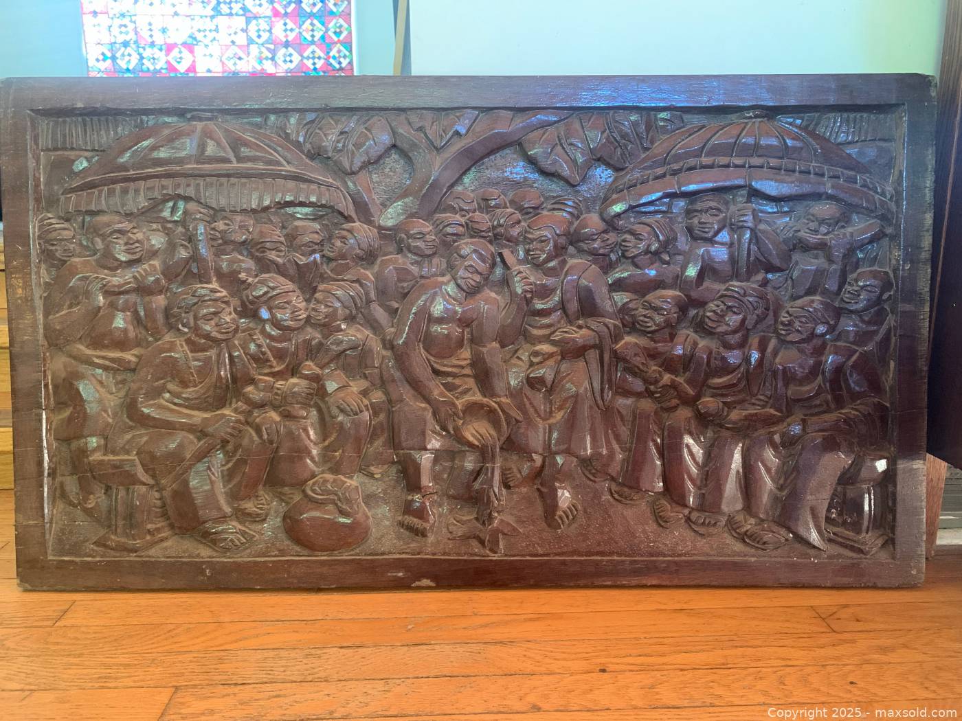 West African carved wood relief panel | Maxsold