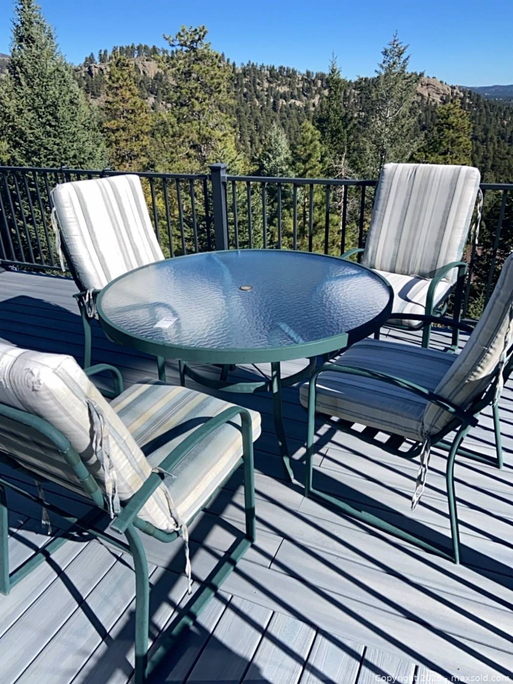 48" green aluminum patio table with 4 chairs | Maxsold