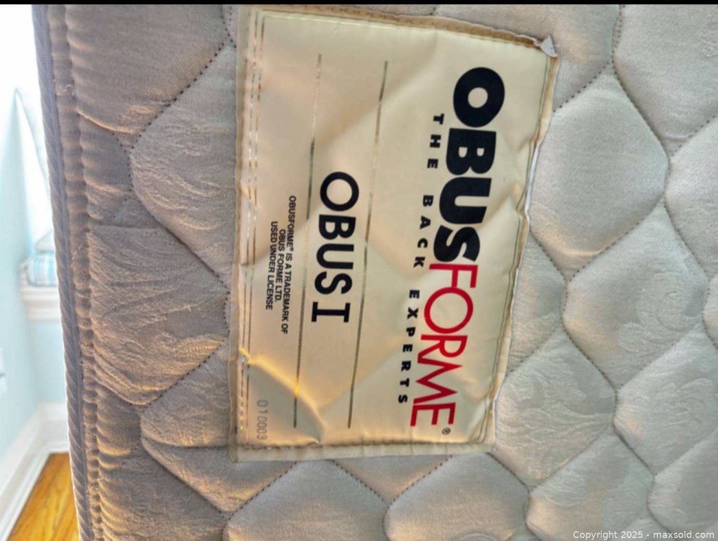 Metal twin bed frame with ObusForme mattress | Maxsold